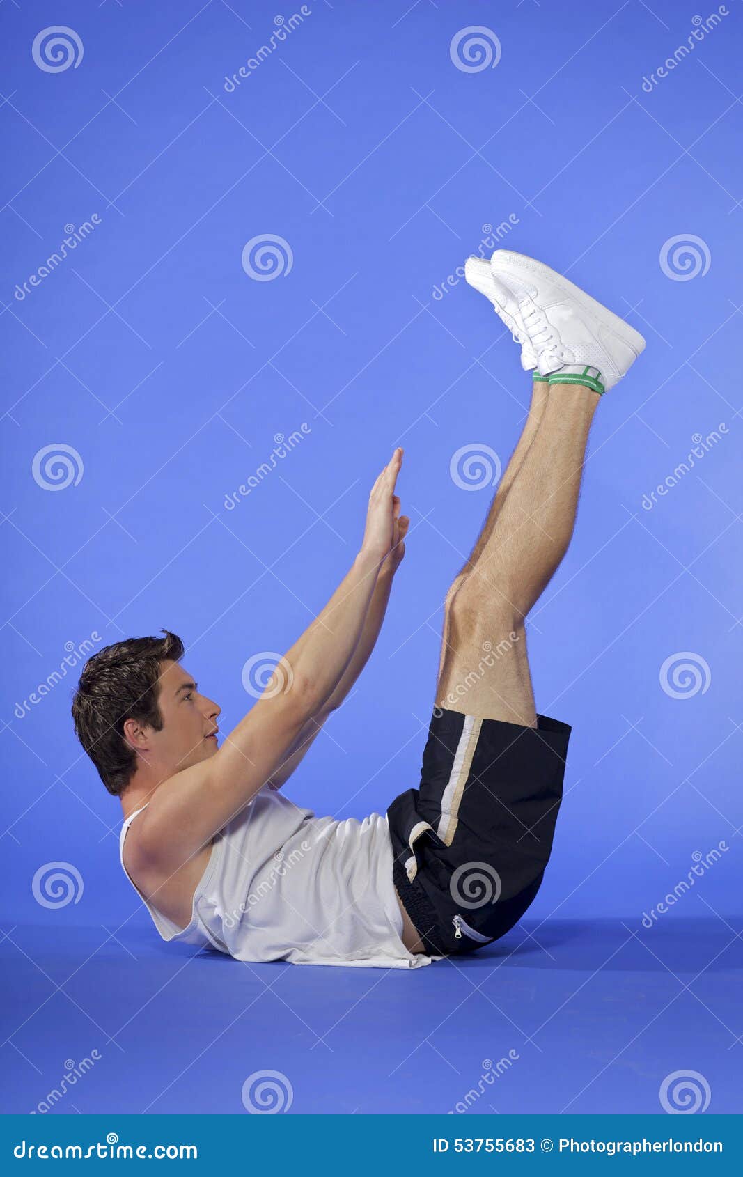 Man Excercising stock image. Image of muscle, arms, sneakers - 53755683