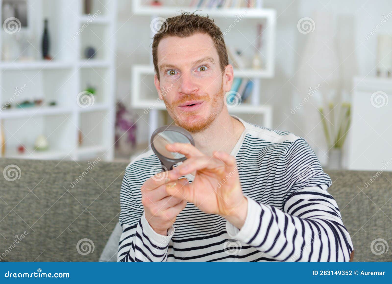 Man Excited about Ring he Viewing through Magnifying Glass Stock Photo ...