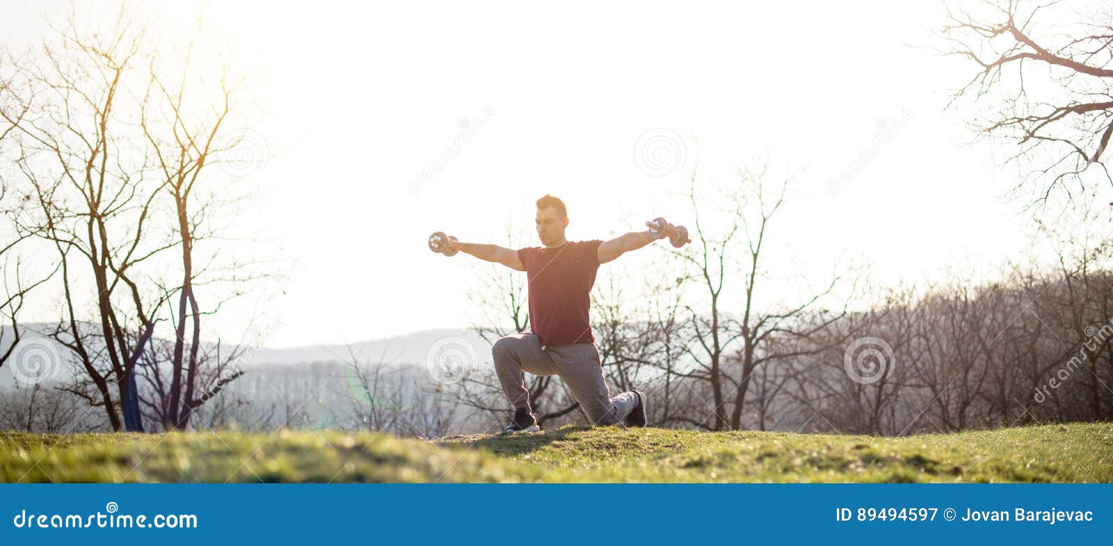 Man Exercise in Nature with Weights Panorama Stock Image - Image of ...