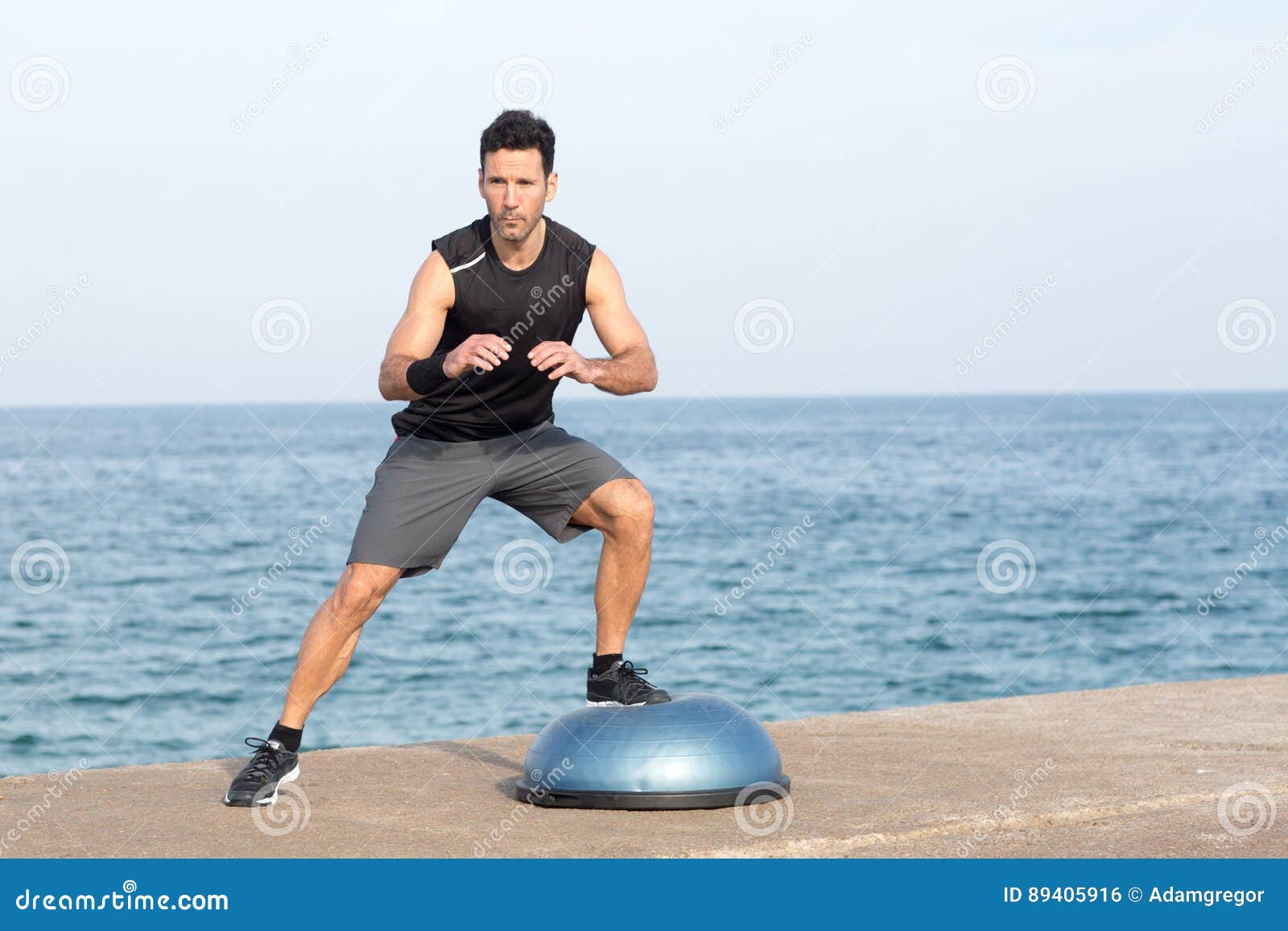 Man Exercising on Balance Platform Stock Photo - Image of strenghten ... Man Exercising on Balance Platform Stock Photo - Image of strenghten ...