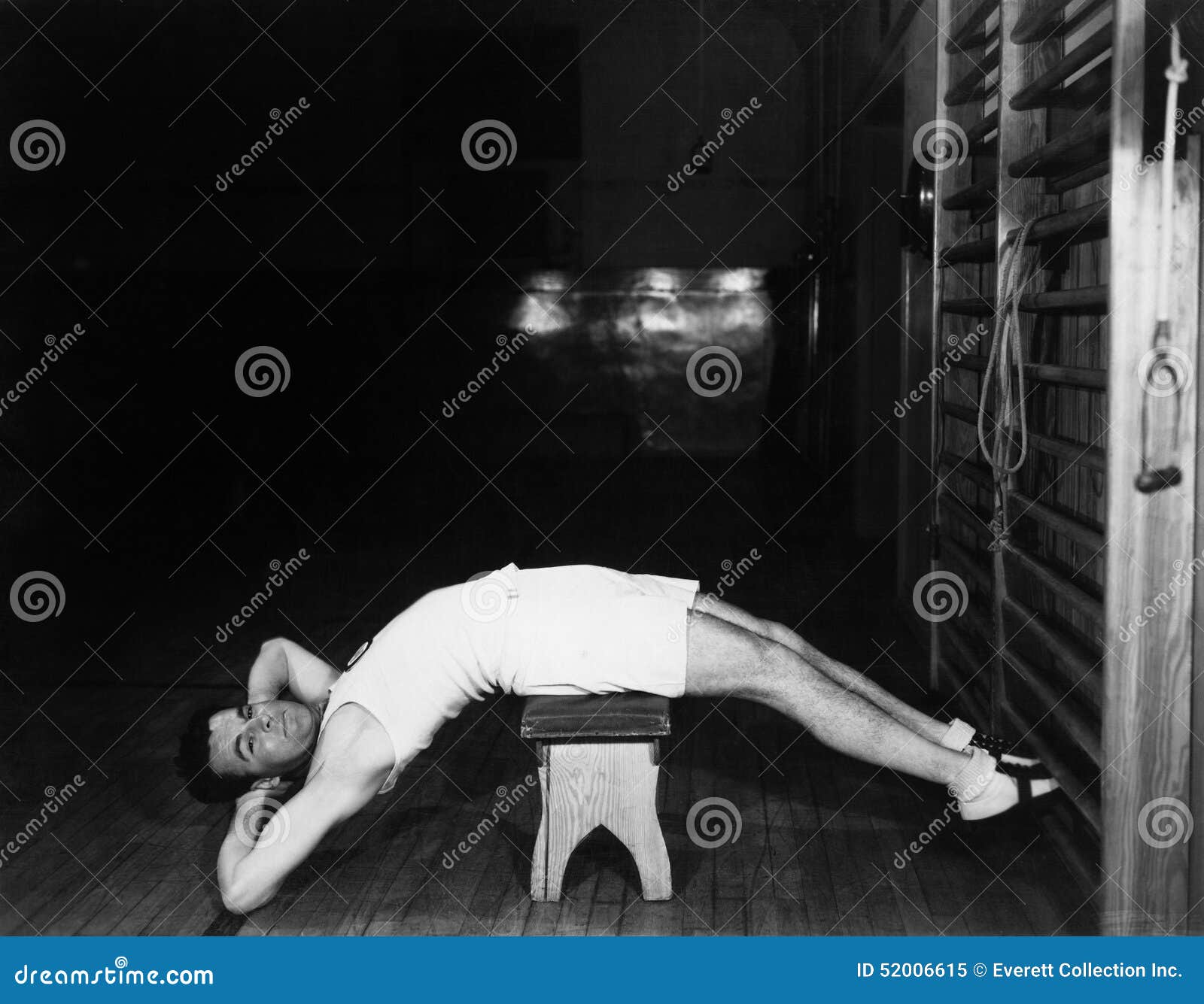 Man exercising on bench stock image. Image of arching - 52006615