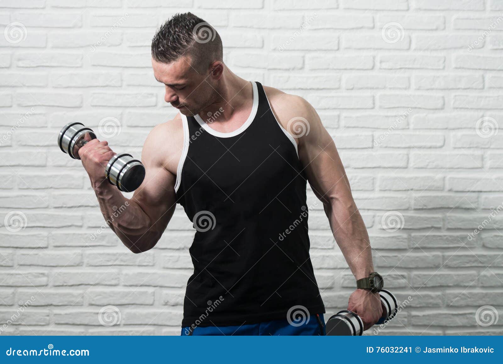 Man Exercising Biceps on White Bricks Background Stock Image - Image of ...