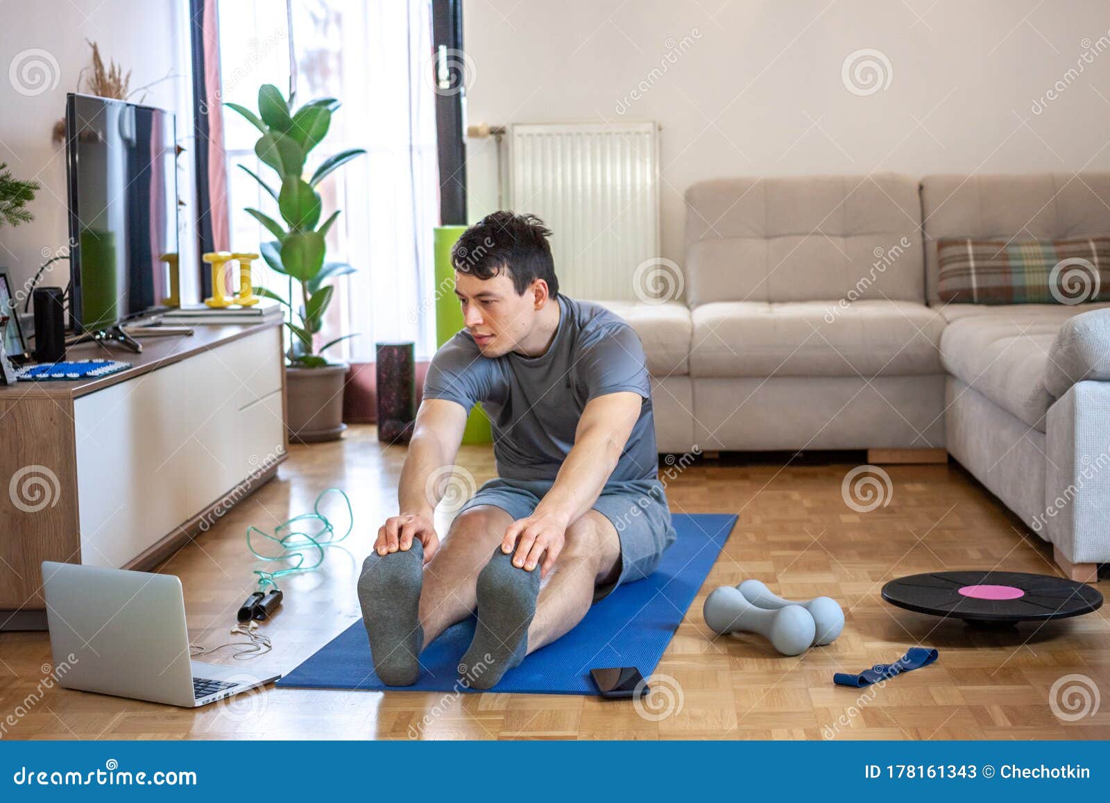 Man Exercising Doing Workout at Home Stock Image - Image of cozy ...