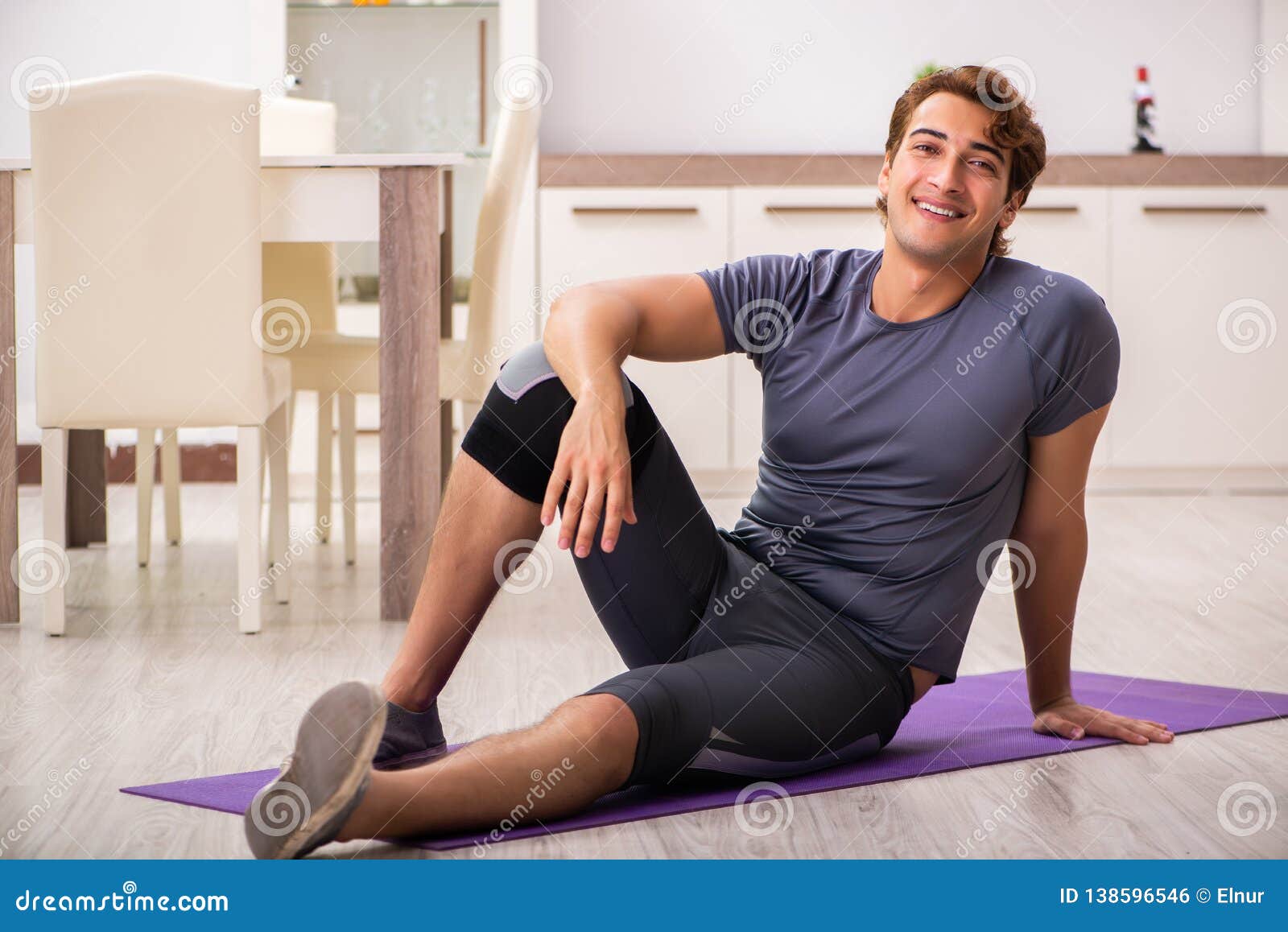 The Man Exercising for Knee Injury Recovery Stock Photo - Image of ...