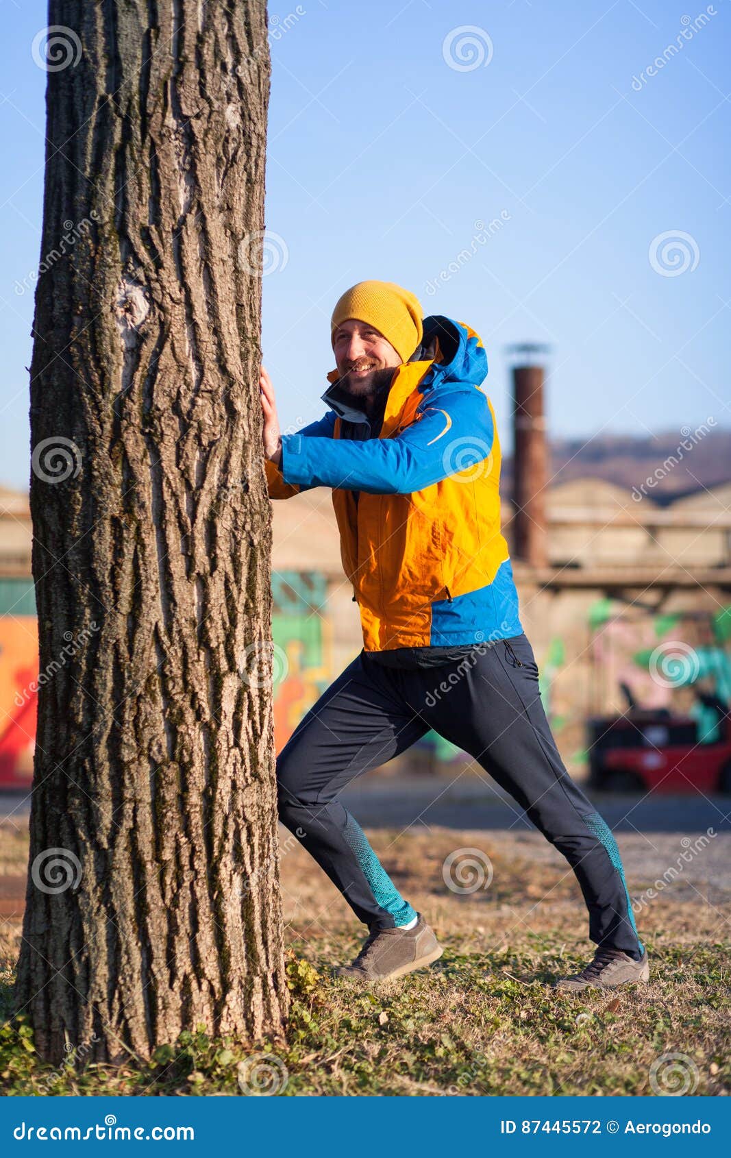 Man Exercising Next To the Tree Stock Photo - Image of sport, caucasian ...