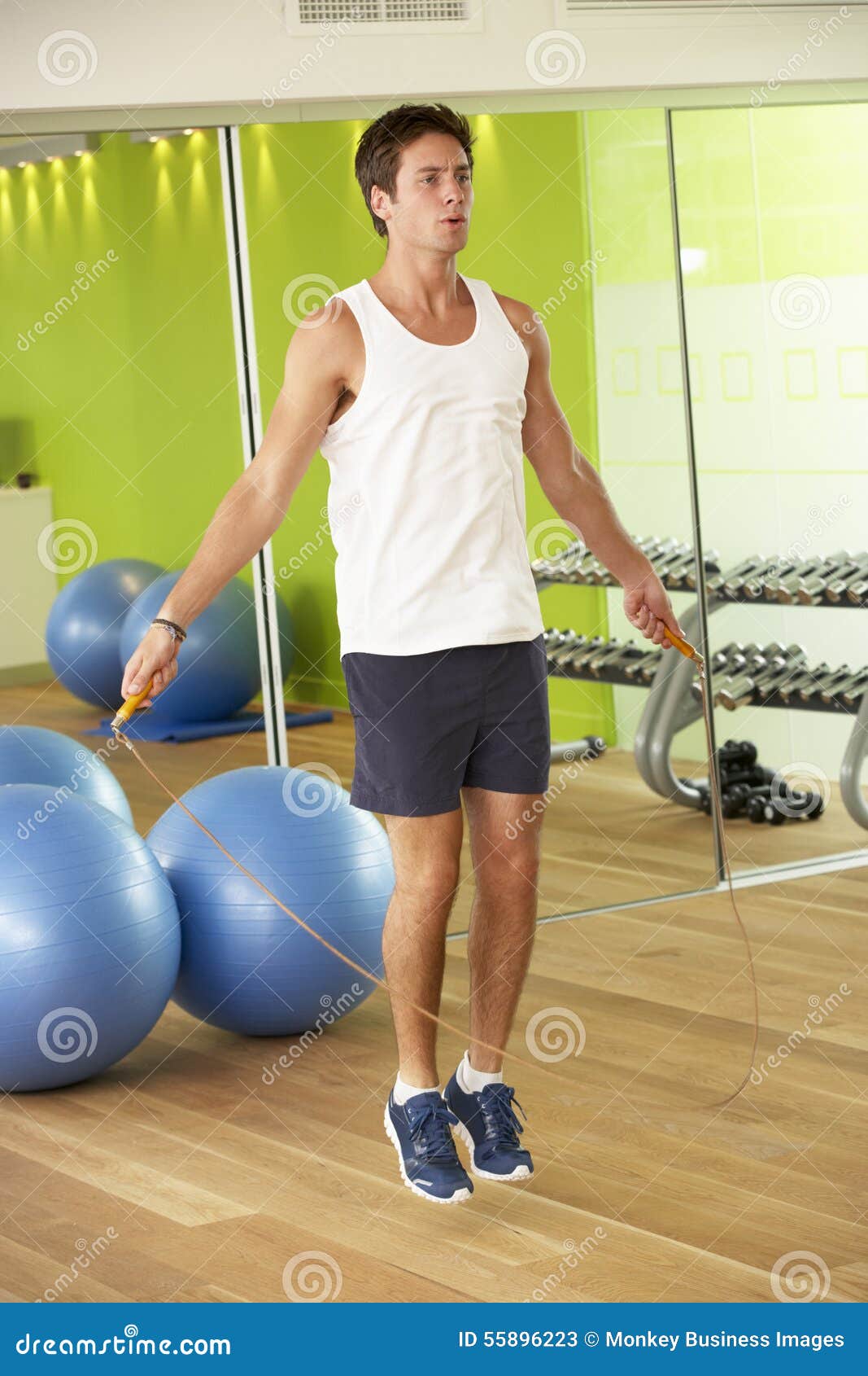 Man Exercising with Skipping Rope in Gym Stock Image - Image of pushing ...