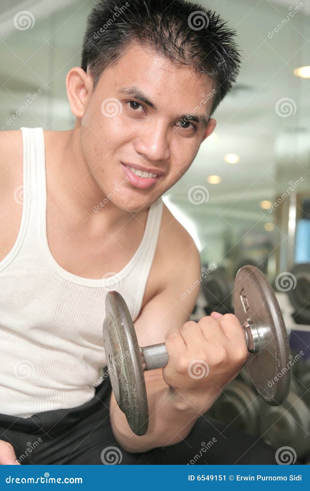 Man exercising smiling stock image. Image of active, weightlifting ...