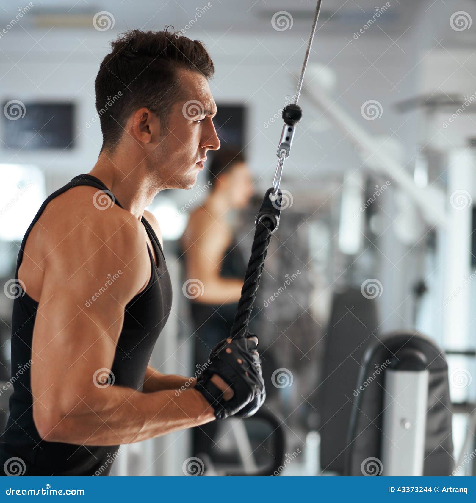 Man Exercising in Trainer for Triceps Muscles Stock Photo - Image of ...