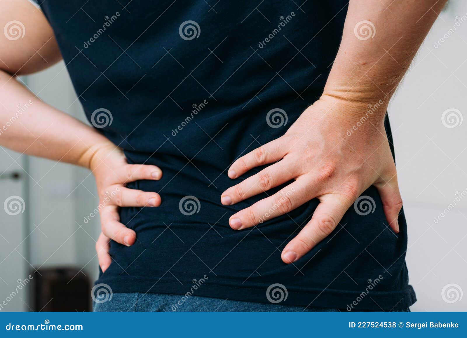 The Man is Experiencing Lower Back Due To Kidney Pain. Stock Photo ...