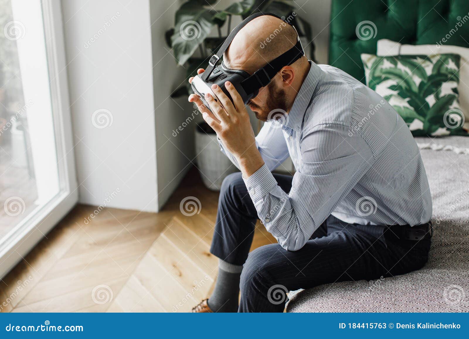 Man Experiencing VR Headset while Lying on Sofa Stock Image - Image of ...