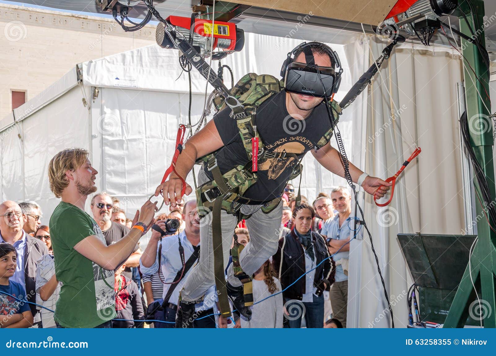 Man Experimenter Feels the Installation Simulator Skydiving Glasses ...