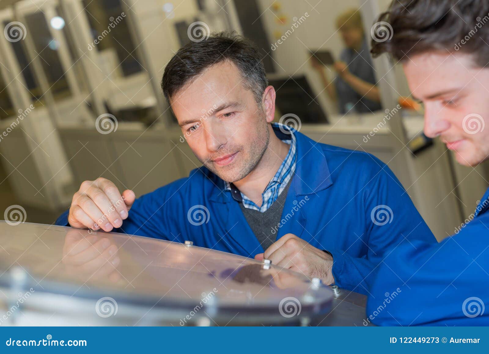 Man Explaining Equipment To Trainee Stock Image - Image of portrait ...