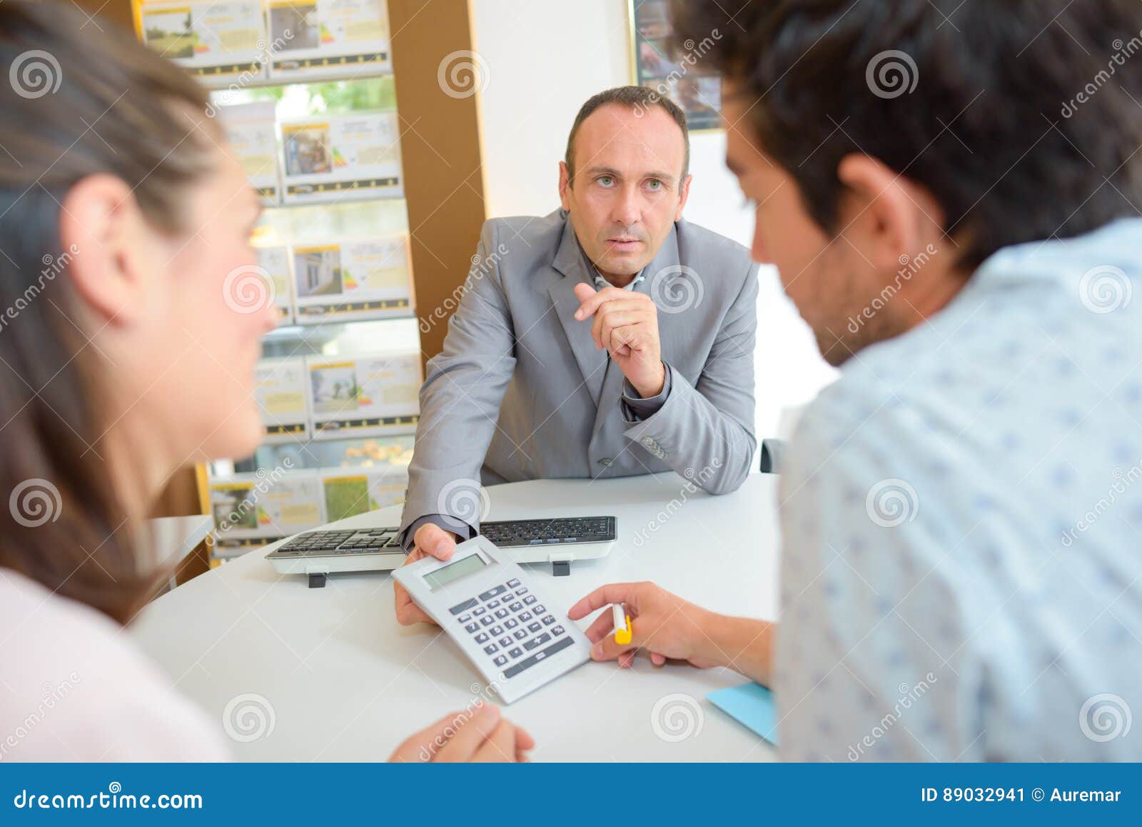 Man Explaining Something To Clients on Foreground Stock Image - Image ...