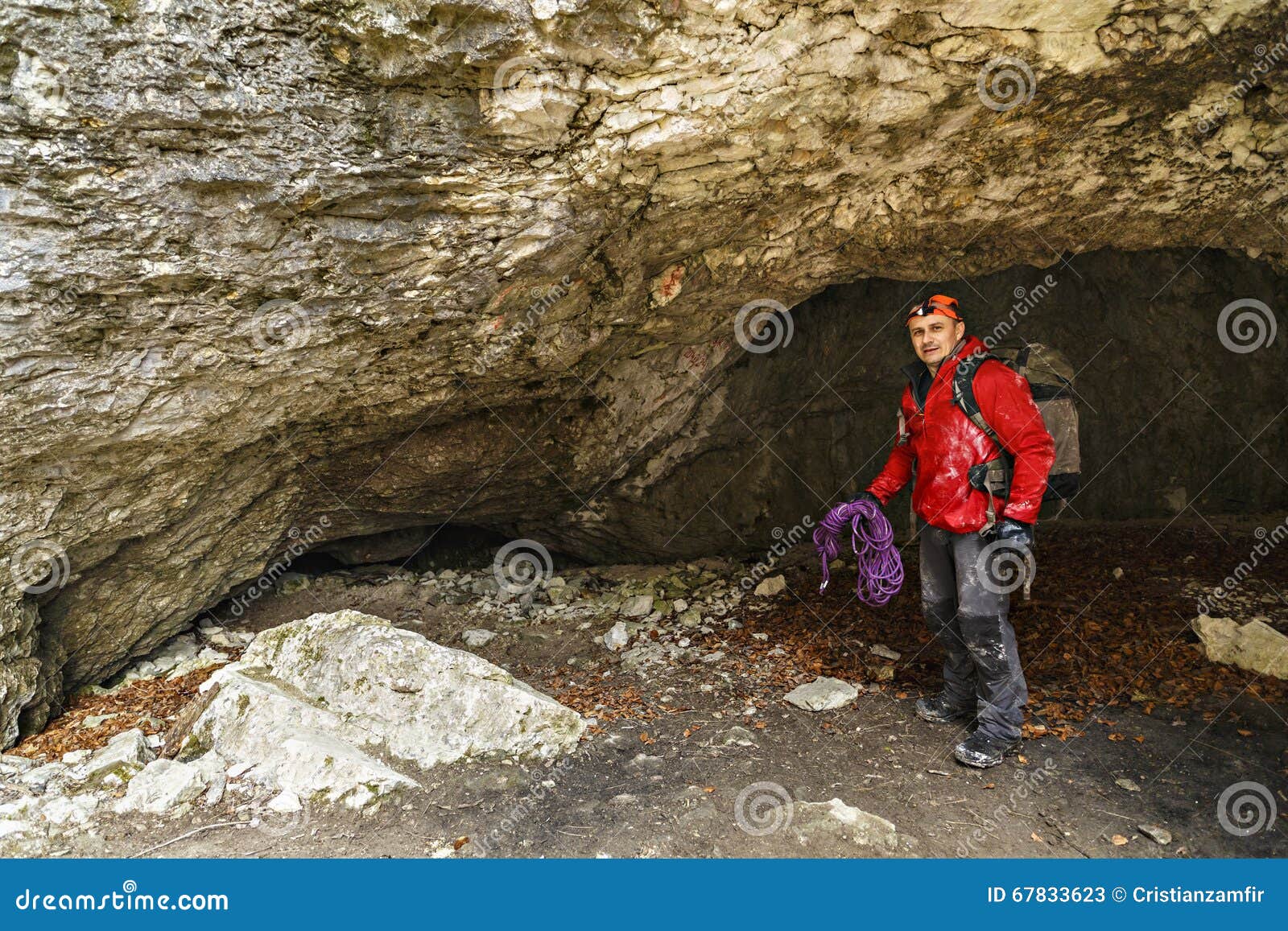 Man explore a cave stock image. Image of mineral, explore - 67833623