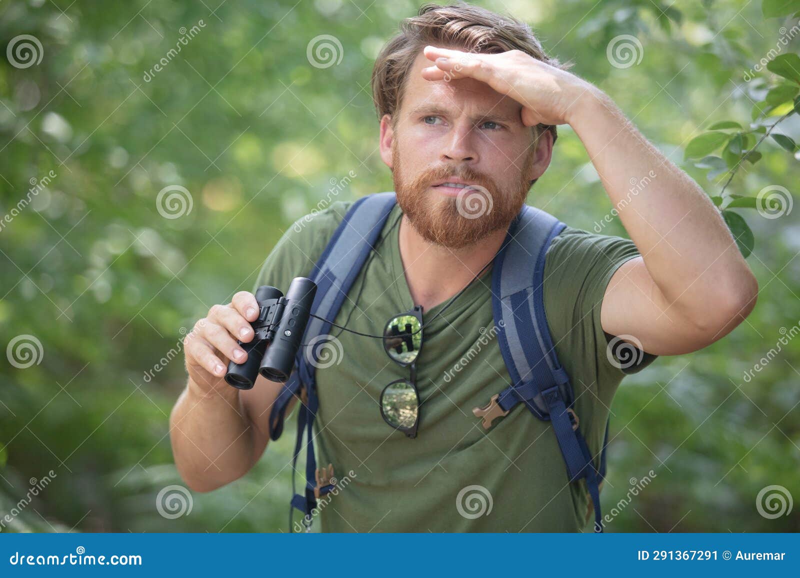 Man Explorer in Forest Scanning Horizon with Binoculars Stock Image ...