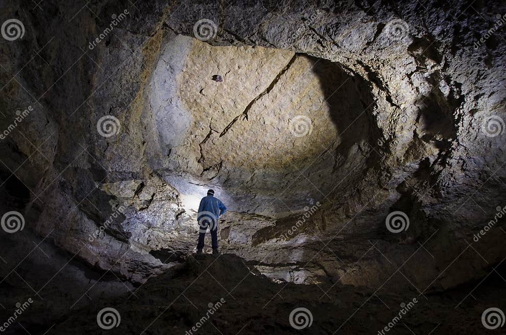 Man Explorer in Huge Cave Underground Stock Photo - Image of earth ...