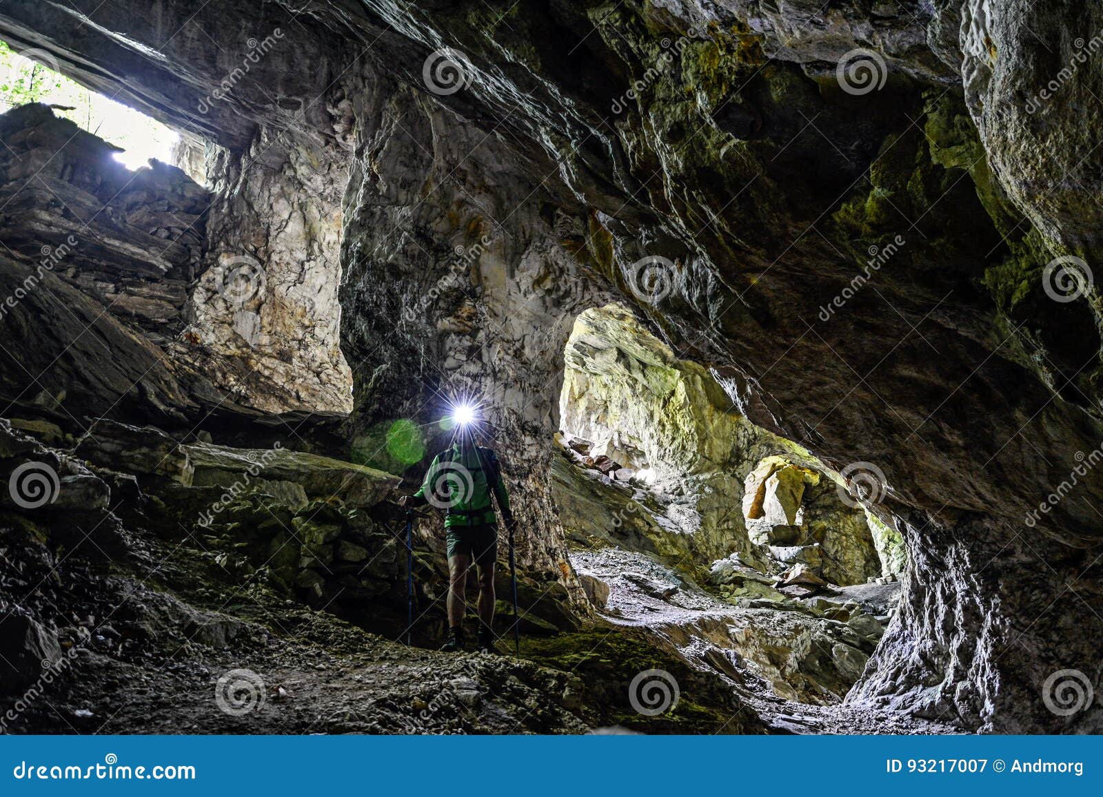 Man exploring cave stock image. Image of alps, dark, minerals - 93217007