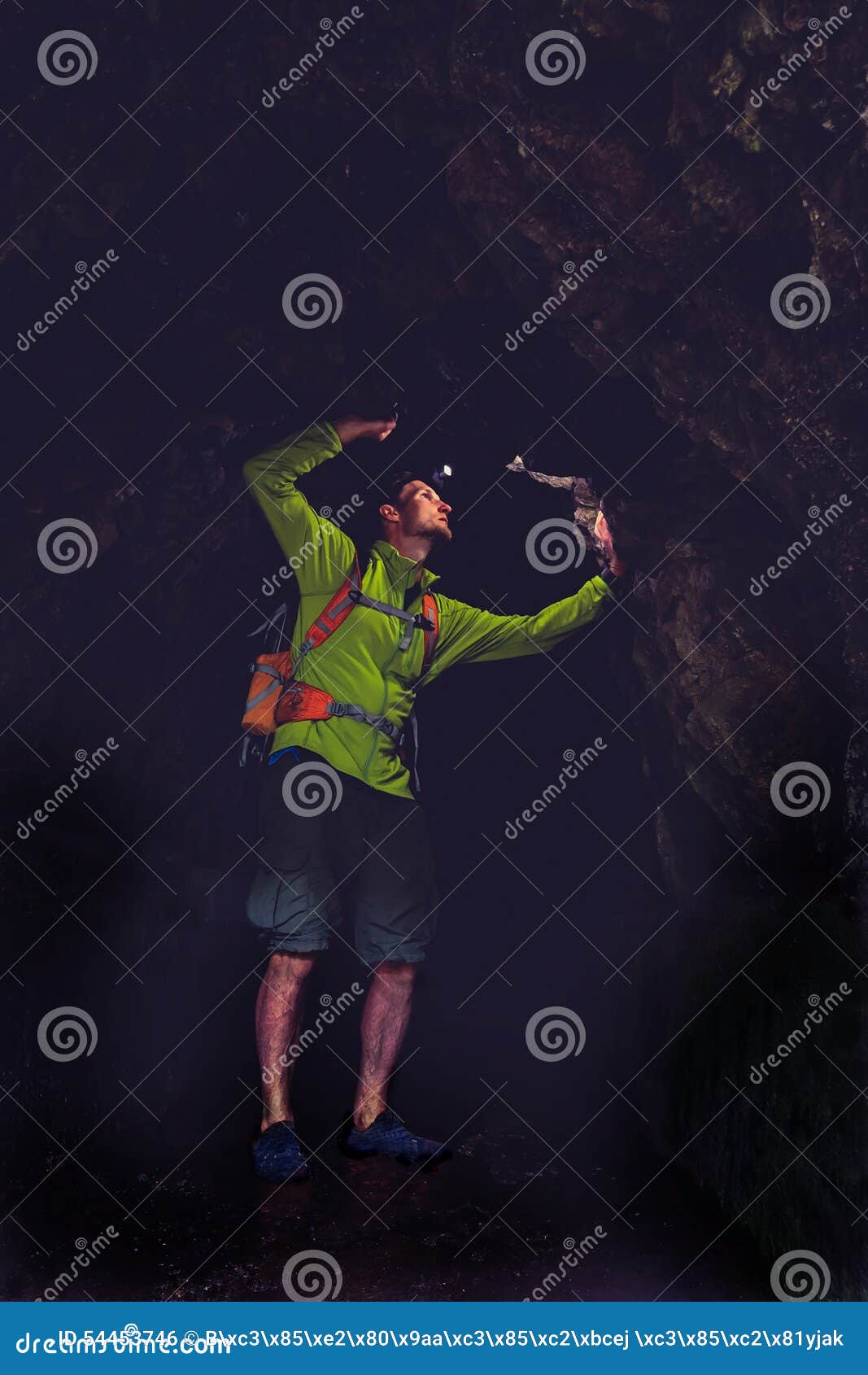 Man Exploring Underground Dark Cave Stock Photo - Image of archeology ...