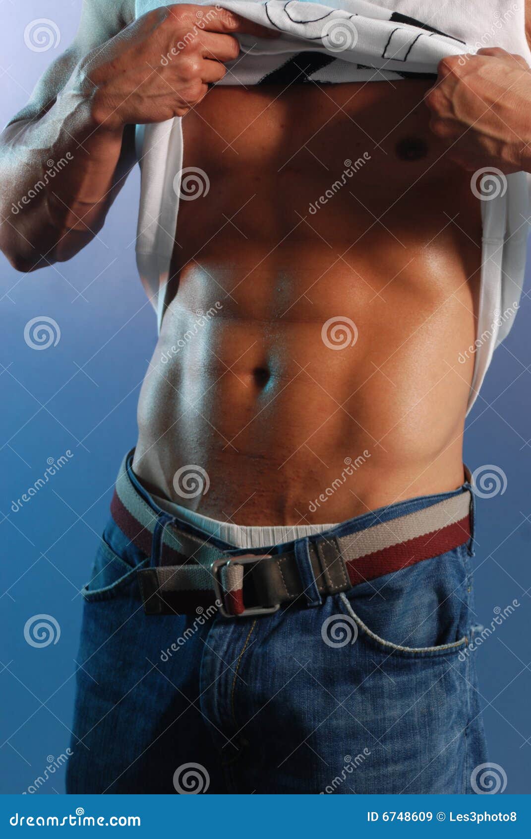 Man exposing abdomen stock image. Image of body, athletic - 6748609
