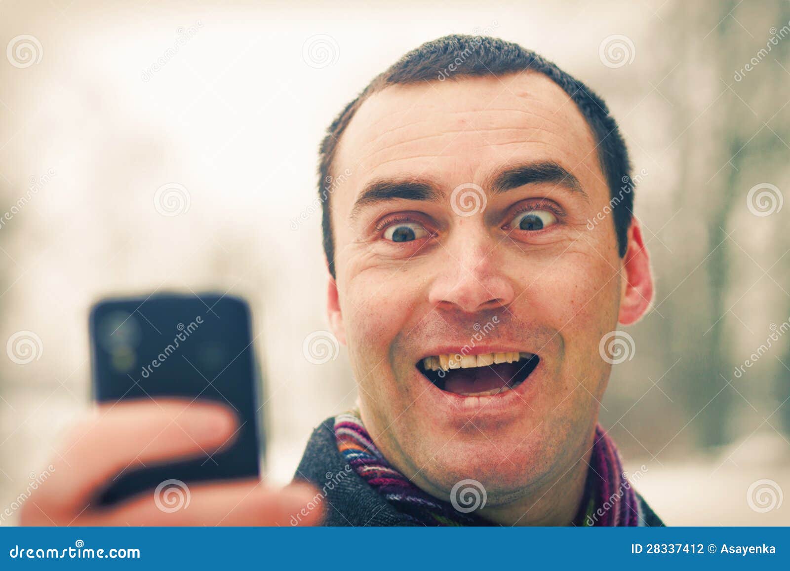 Man Expresses Emotion with Mobile Phone Stock Photo - Image of acket ...