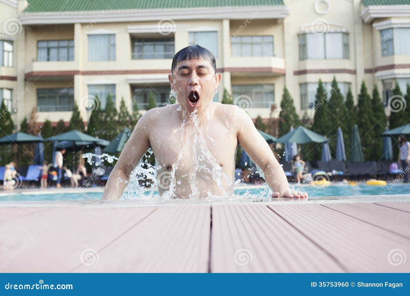 Man with Eyes Closed and Mouth Open Exiting the Pool Stock Photo ...
