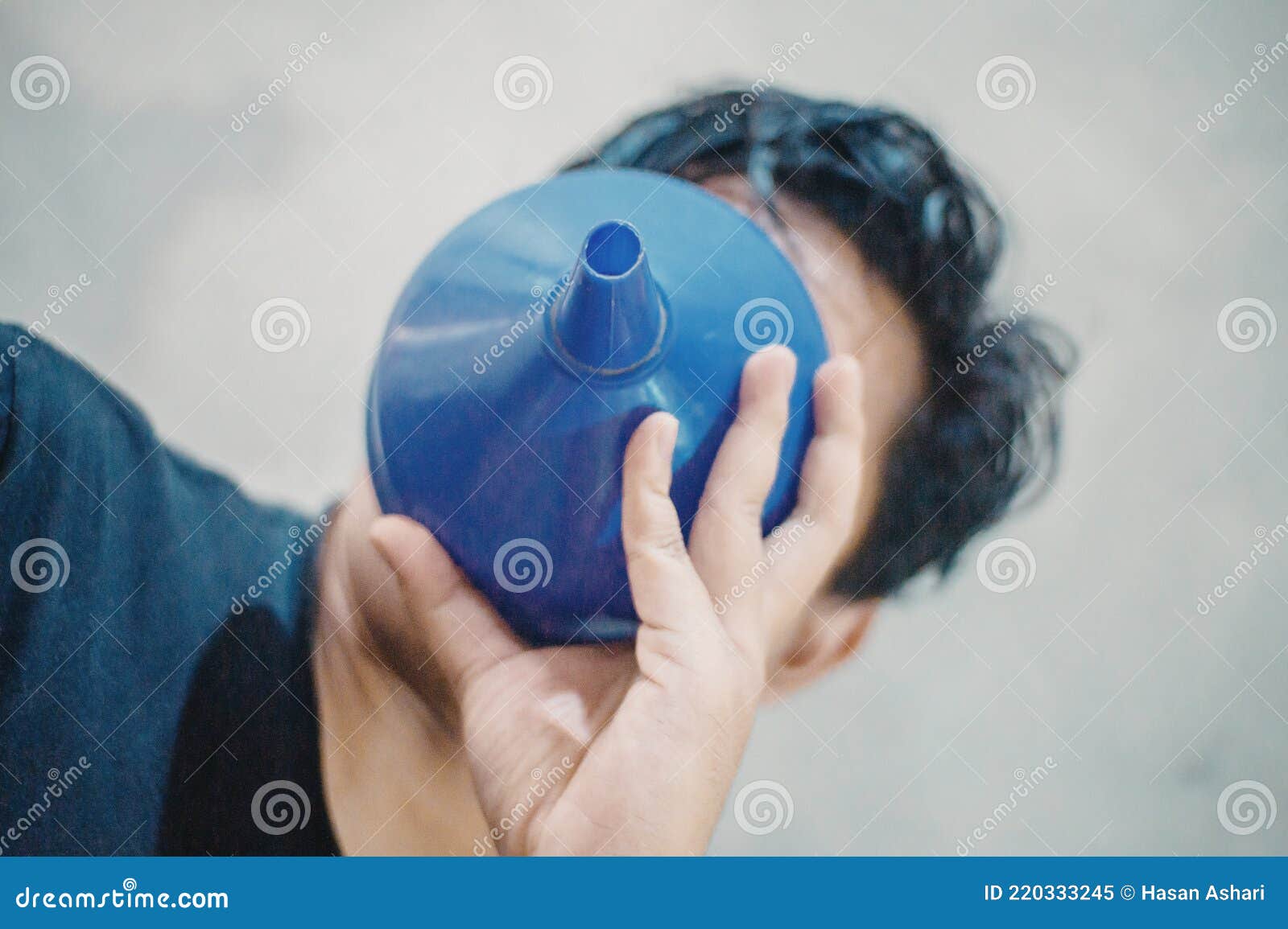 A Man with a Face Covered in a Blue Funnel Stock Image - Image of mouth ...