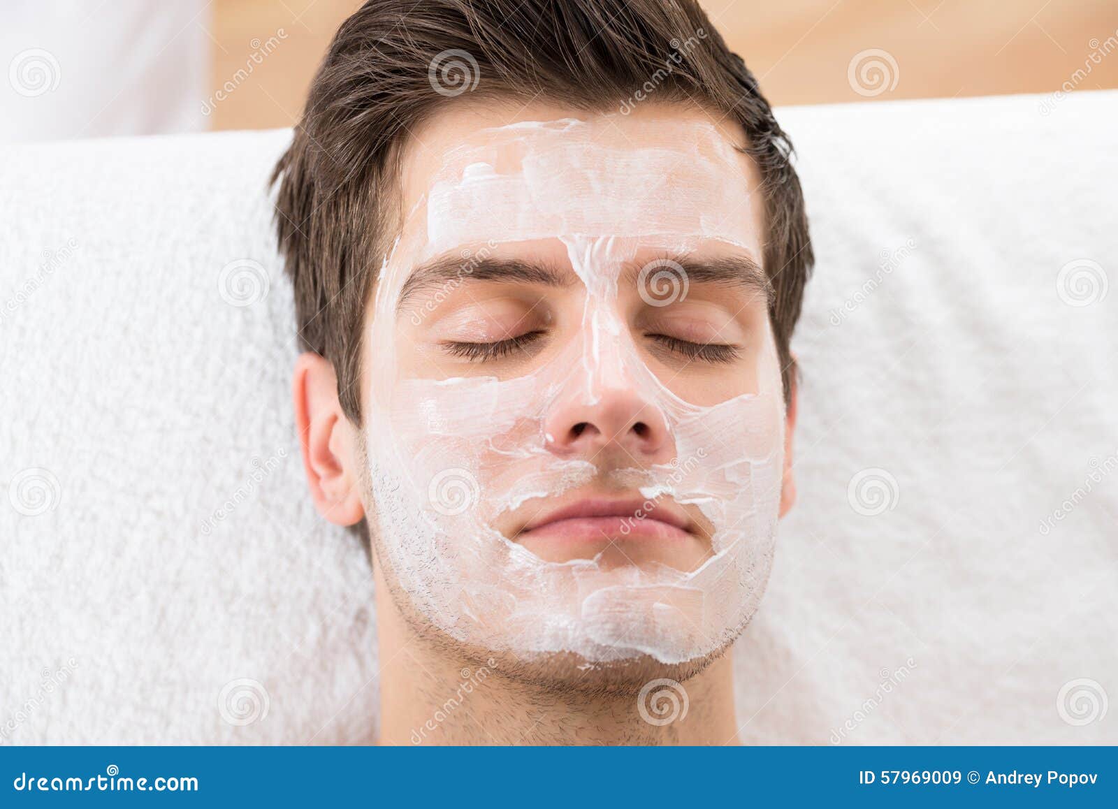 Man with Face Mask stock image. Image of applying, moisturizing - 57969009