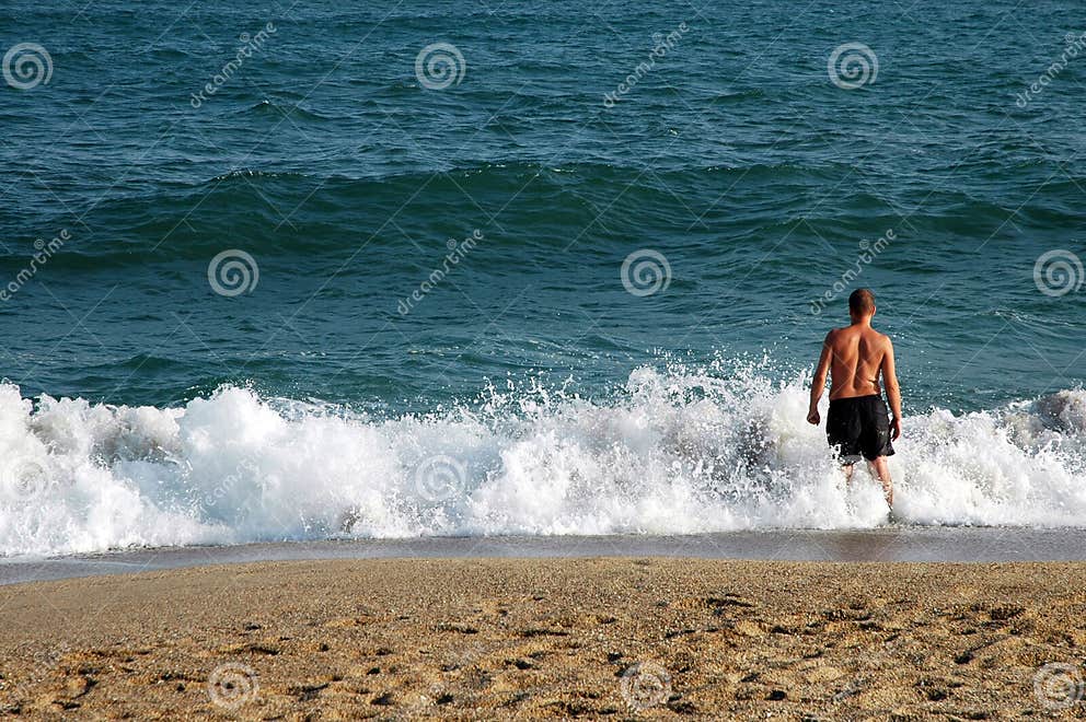 A man in face the ocean stock photo. Image of secluded - 7166108