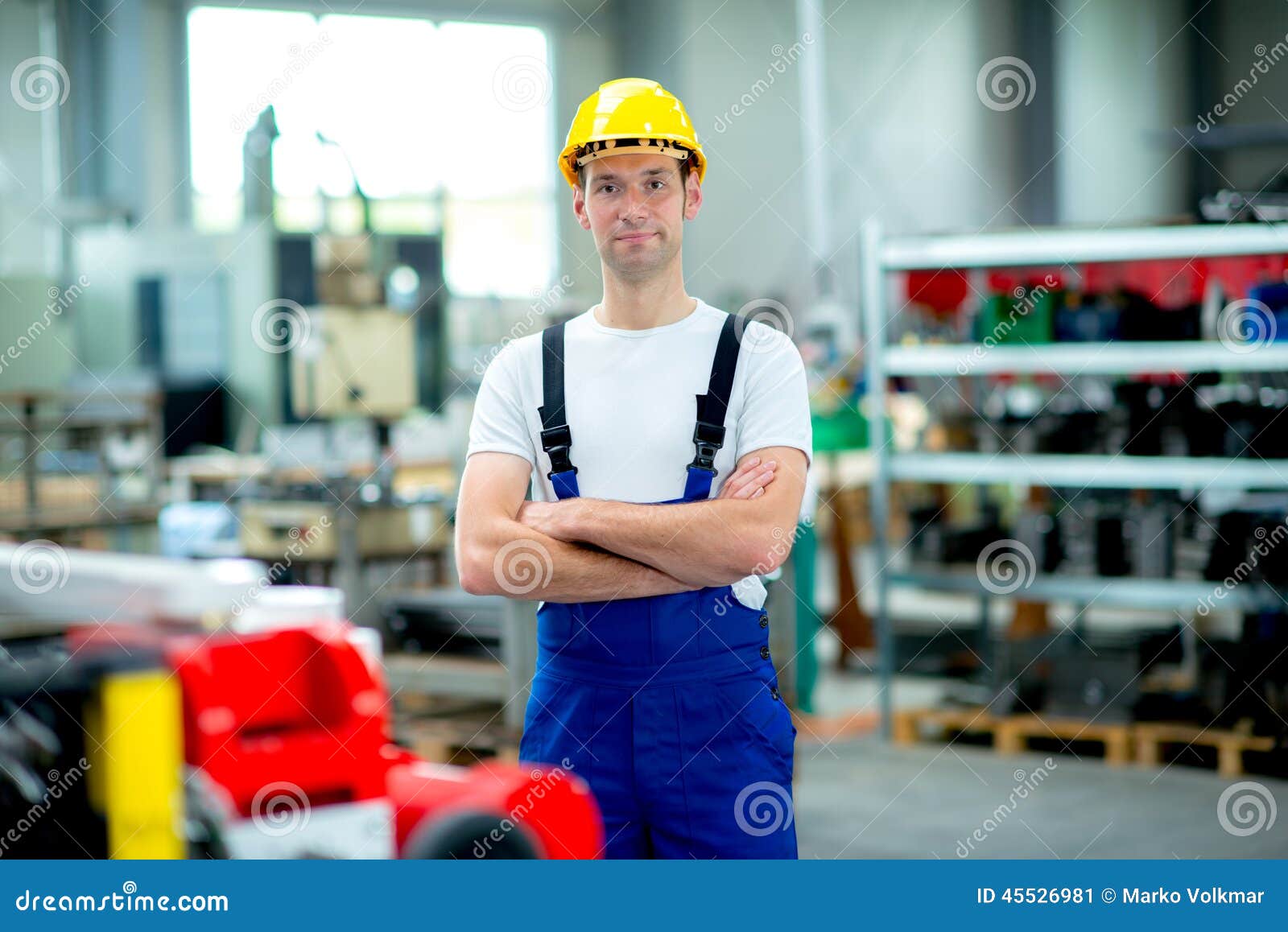 Man in a factory stock image. Image of business, helmet - 45526981