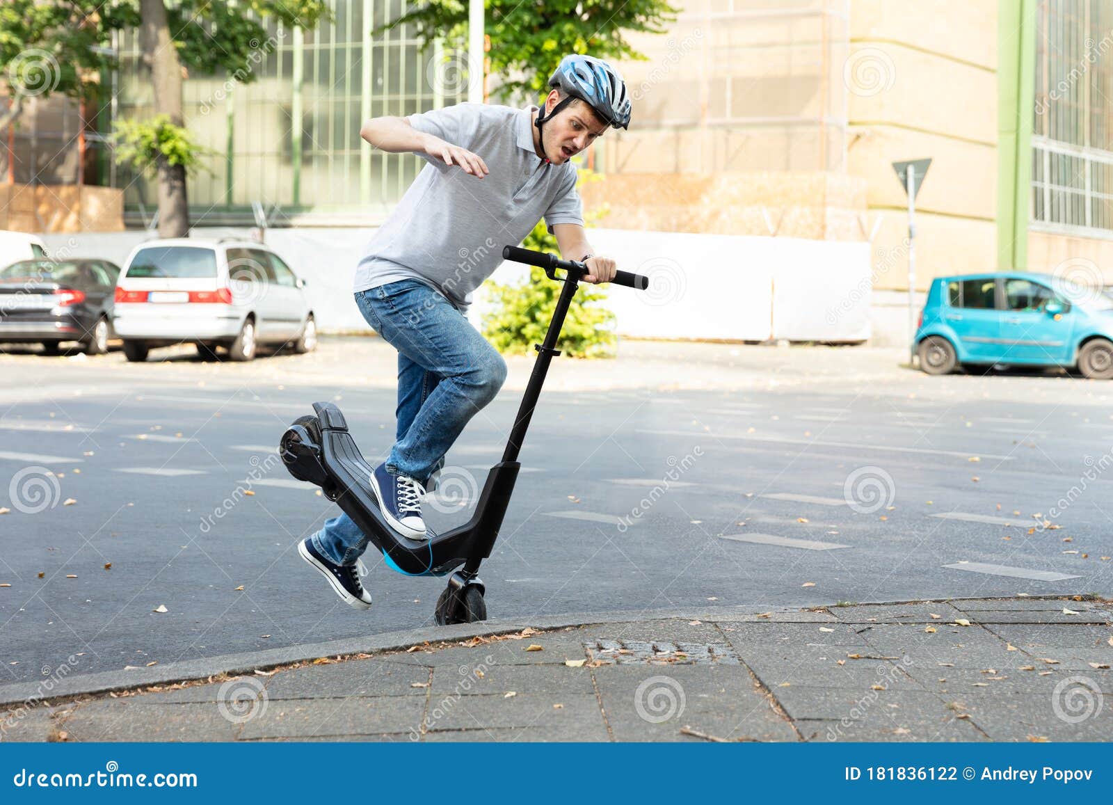 Man Falling from E-Scooter stock photo. Image of accident - 181836122