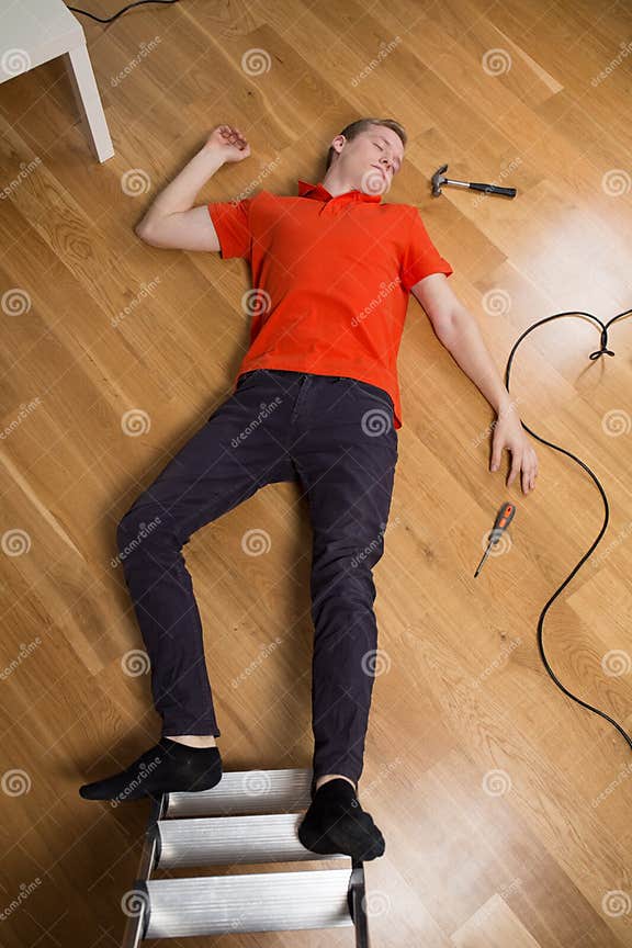Man after Falling from Ladder Stock Photo - Image of person, body: 55657326