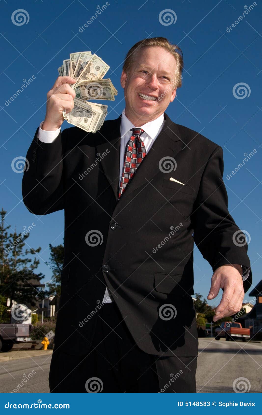 Man Fanning Himself with Money. Stock Image - Image of concept, loan ...