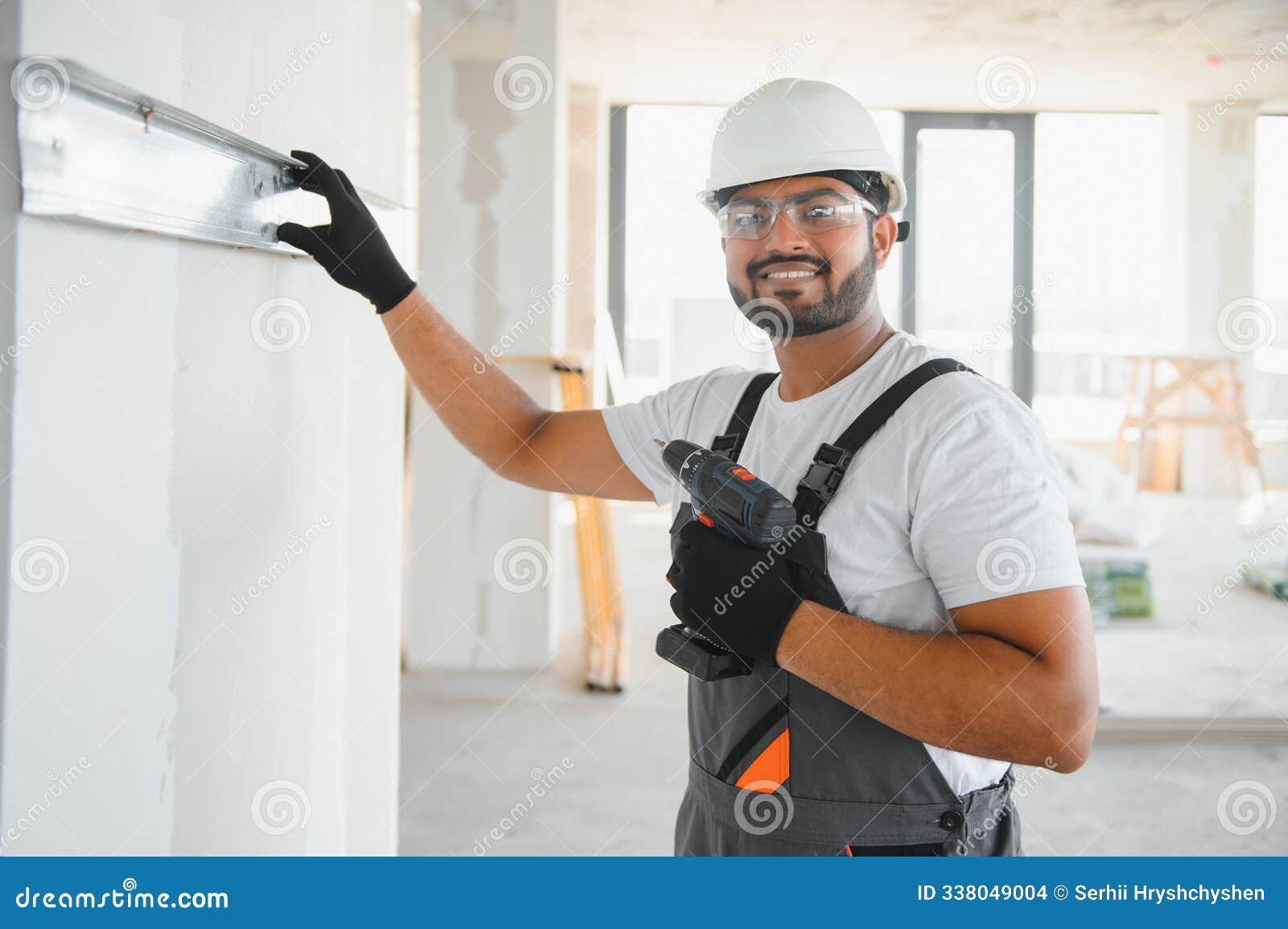 Man Fasten Metal Profile Frame To the Wall for Draywall Bulkhead Stock ...