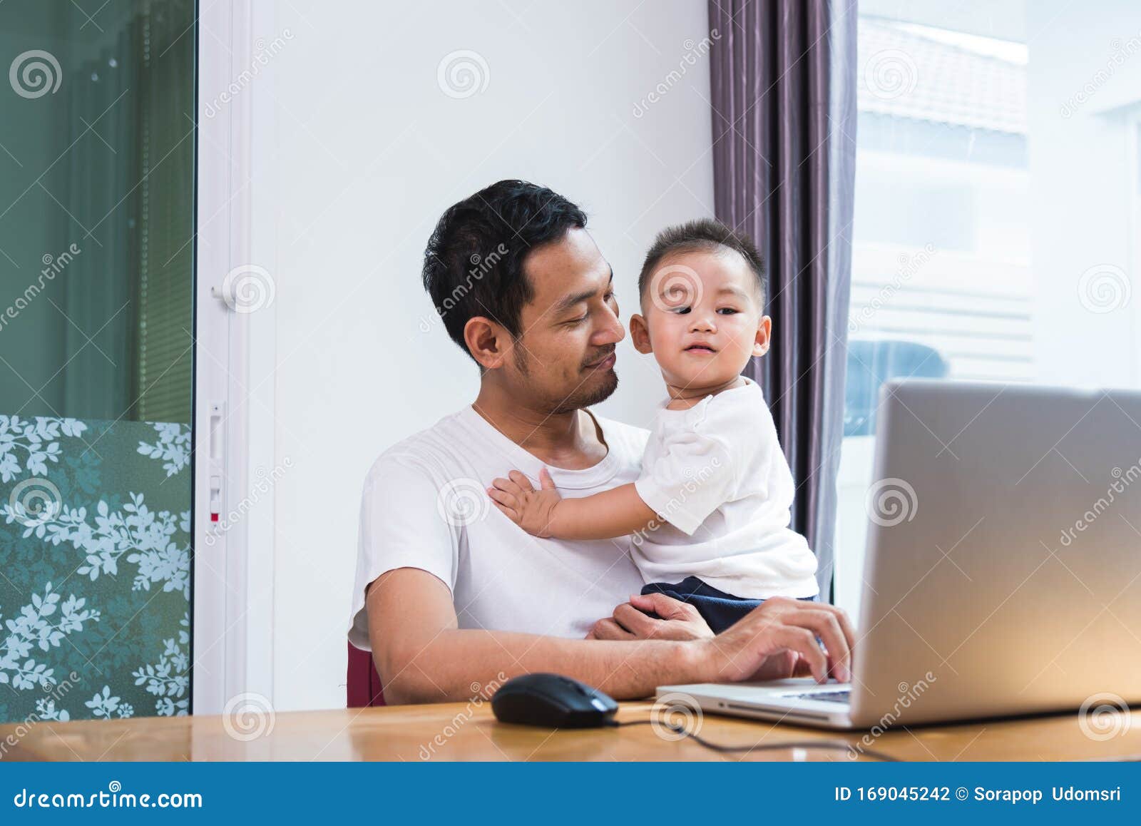 Man Father Using Working on Laptop Computer Stock Photo - Image of care ...