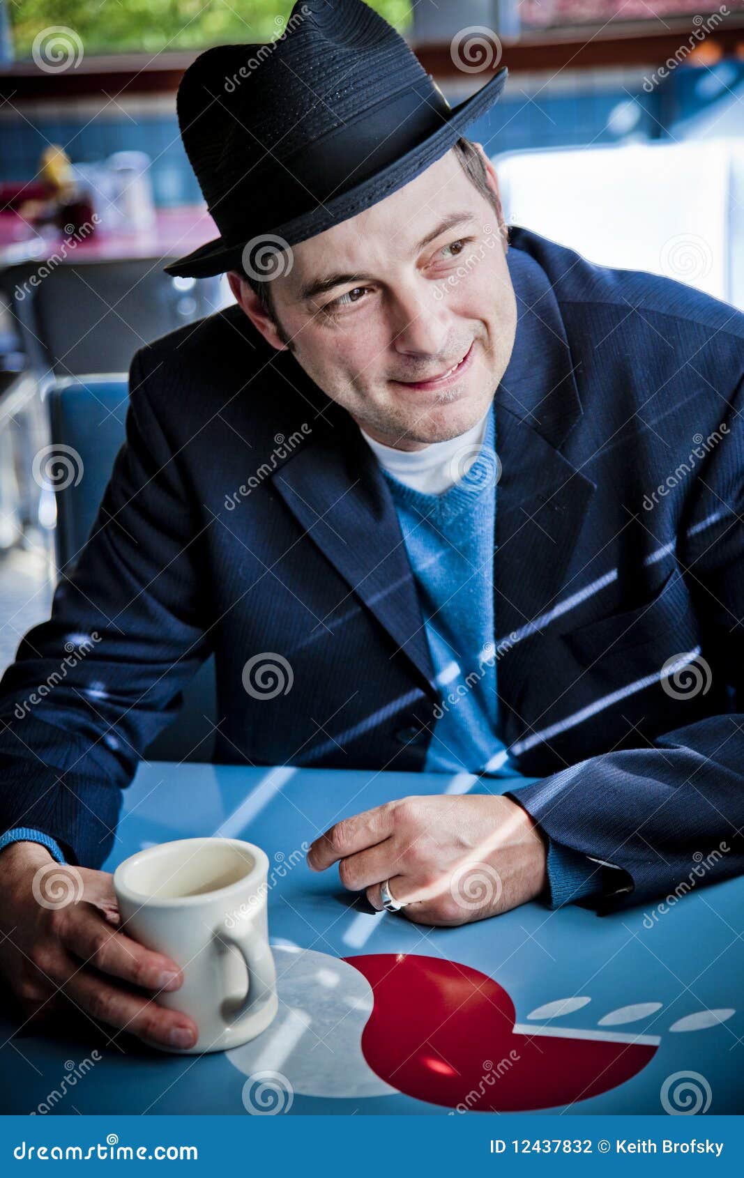 Man in Fedora Sitting in Diner Stock Photo - Image of handsome, brown ...