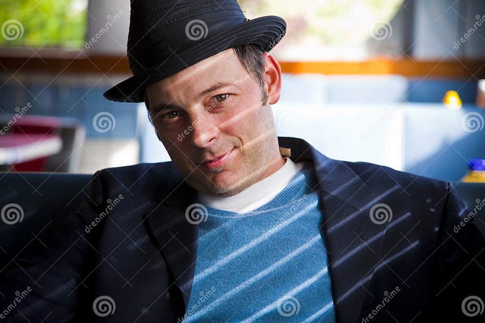 Man in Fedora Sitting in Diner Stock Image - Image of hipster ...