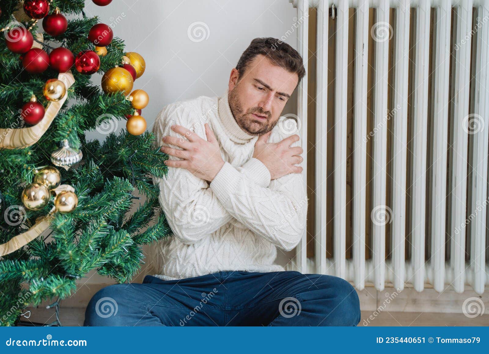 Man Feeling Cold at Home with Home Heating Trouble during Christmas ...
