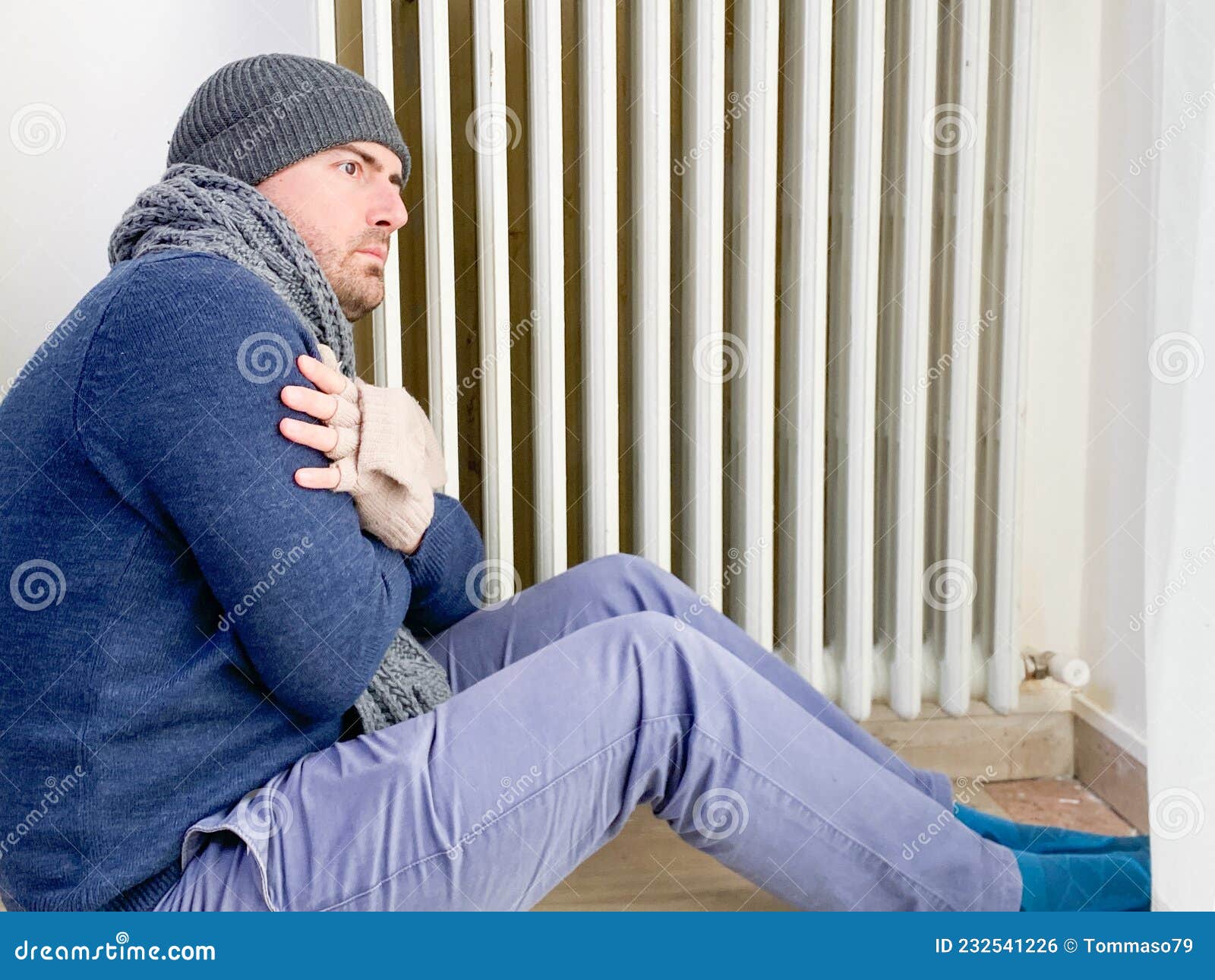 Man Feeling Cold at Home with Home Heating Trouble Stock Photo - Image ...