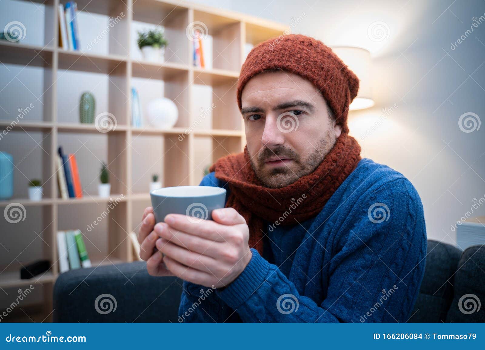 Man Feeling Very Cold at Home with Warm Clothes Stock Photo - Image of ...
