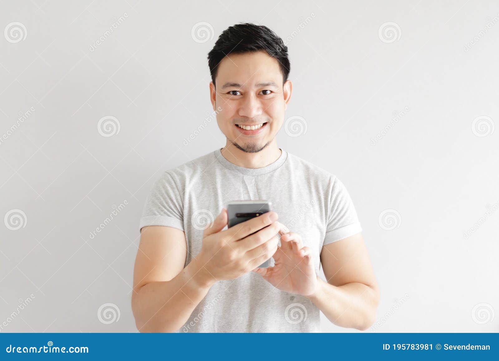 Man Feels Happy with the Application in the Smartphone. Stock Image ...
