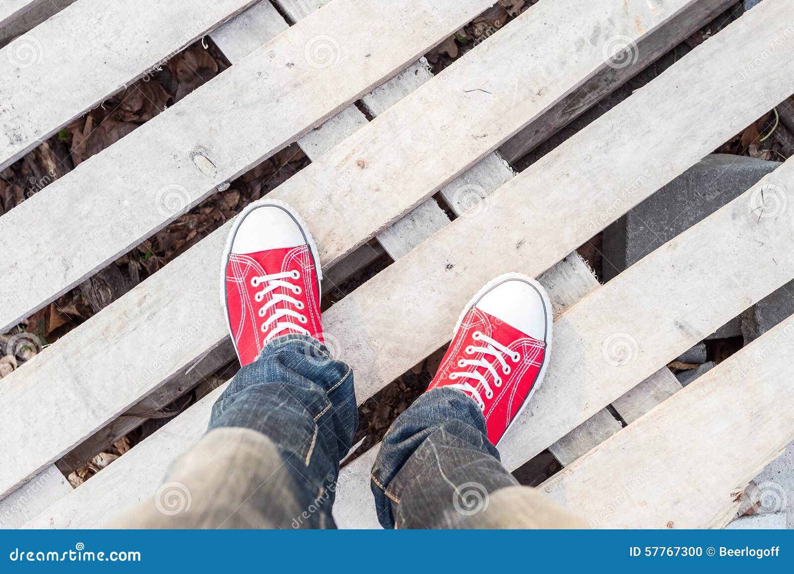 Man Feet in Red Sneakers on Cobbled Road Stock Photo - Image of ...