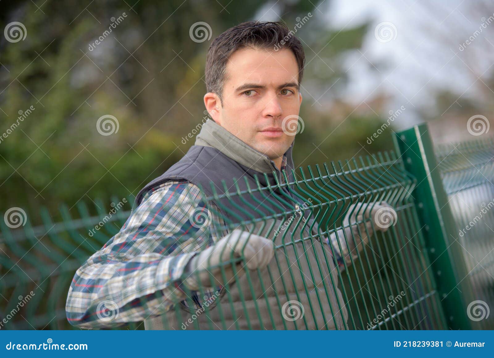 Man fencing erector worker stock image. Image of erect - 218239381