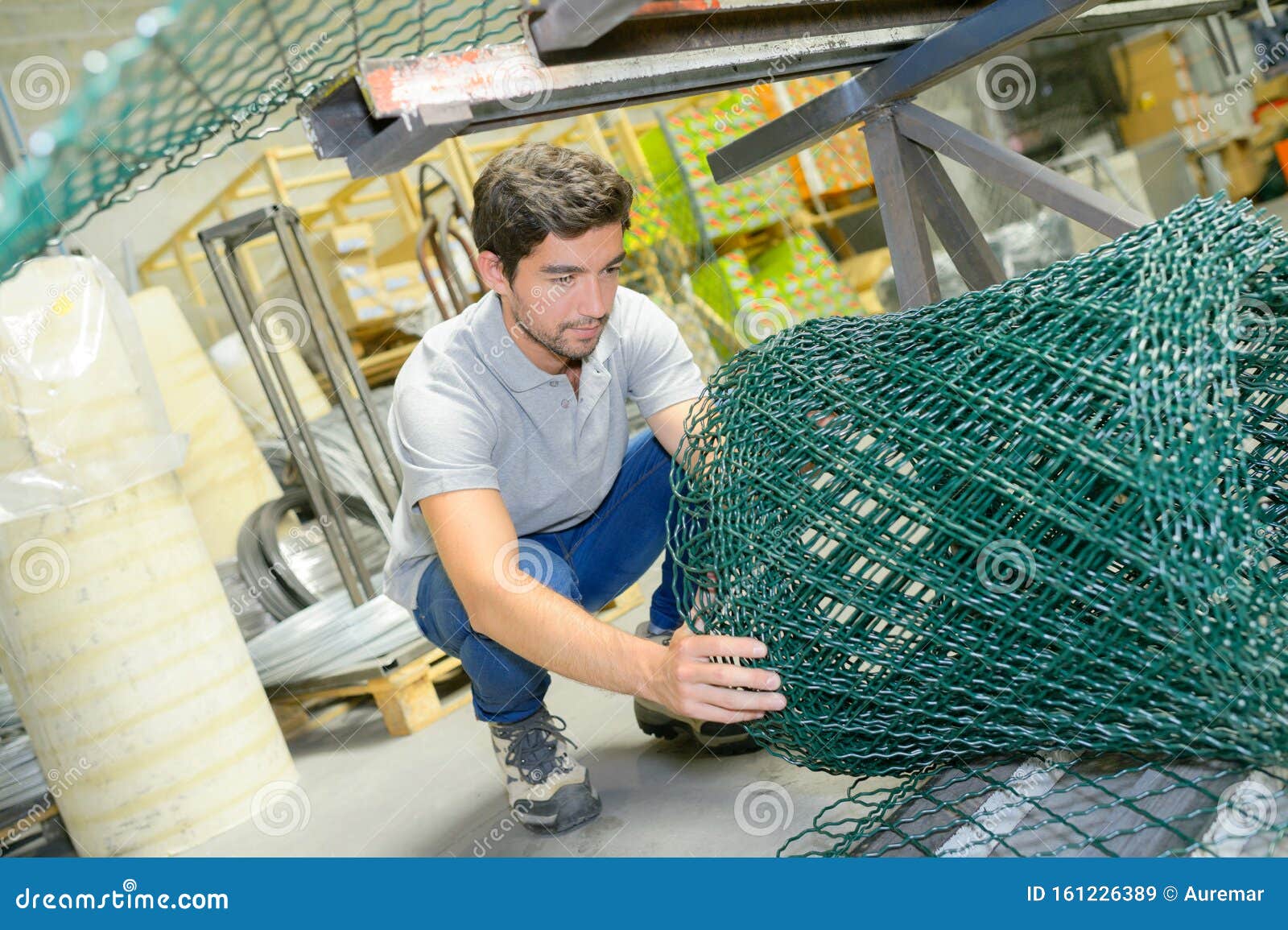 Man in fencing factory stock image. Image of handsome - 161226389