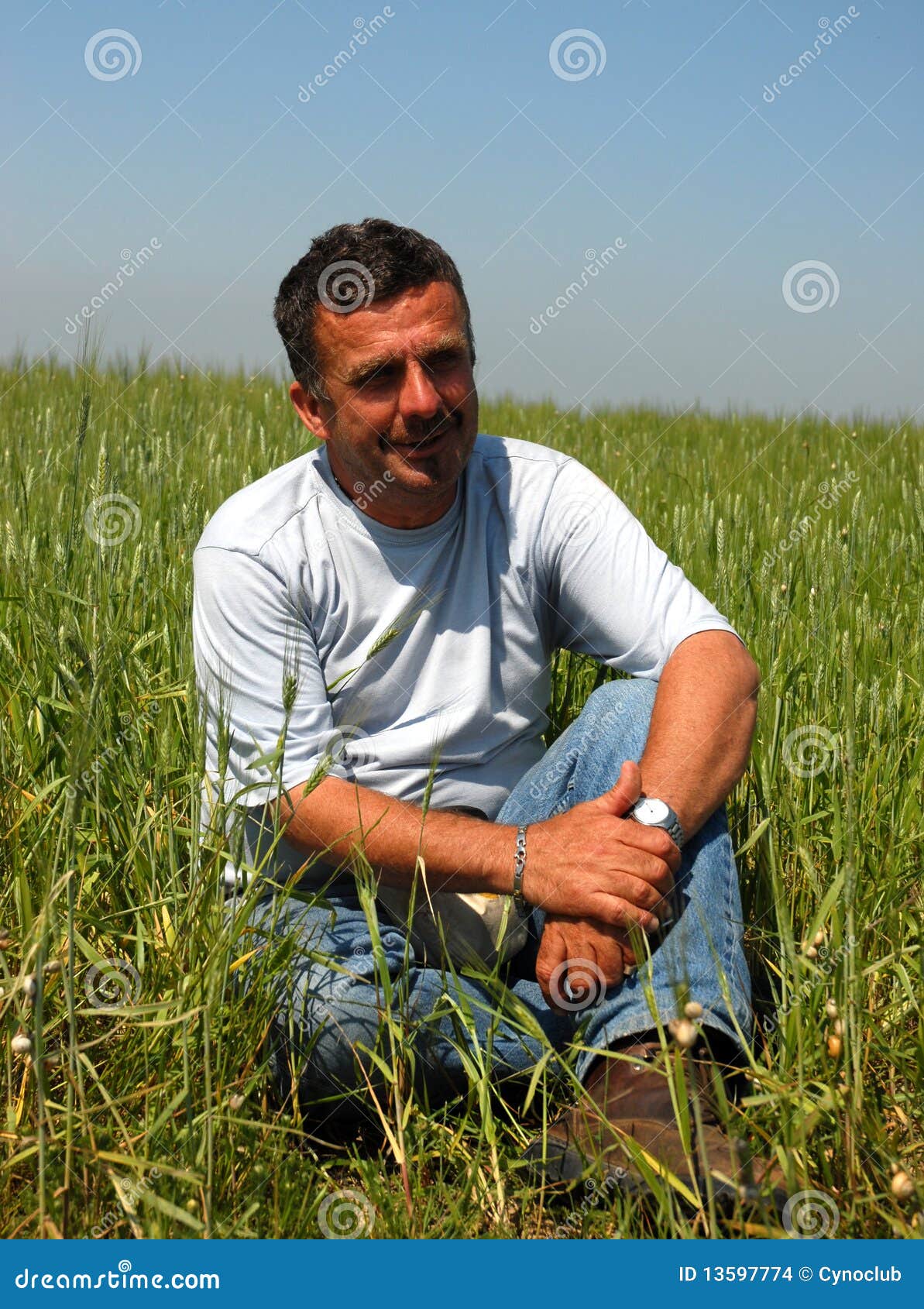 Man in a field stock photo. Image of grass, health, garden - 13597774