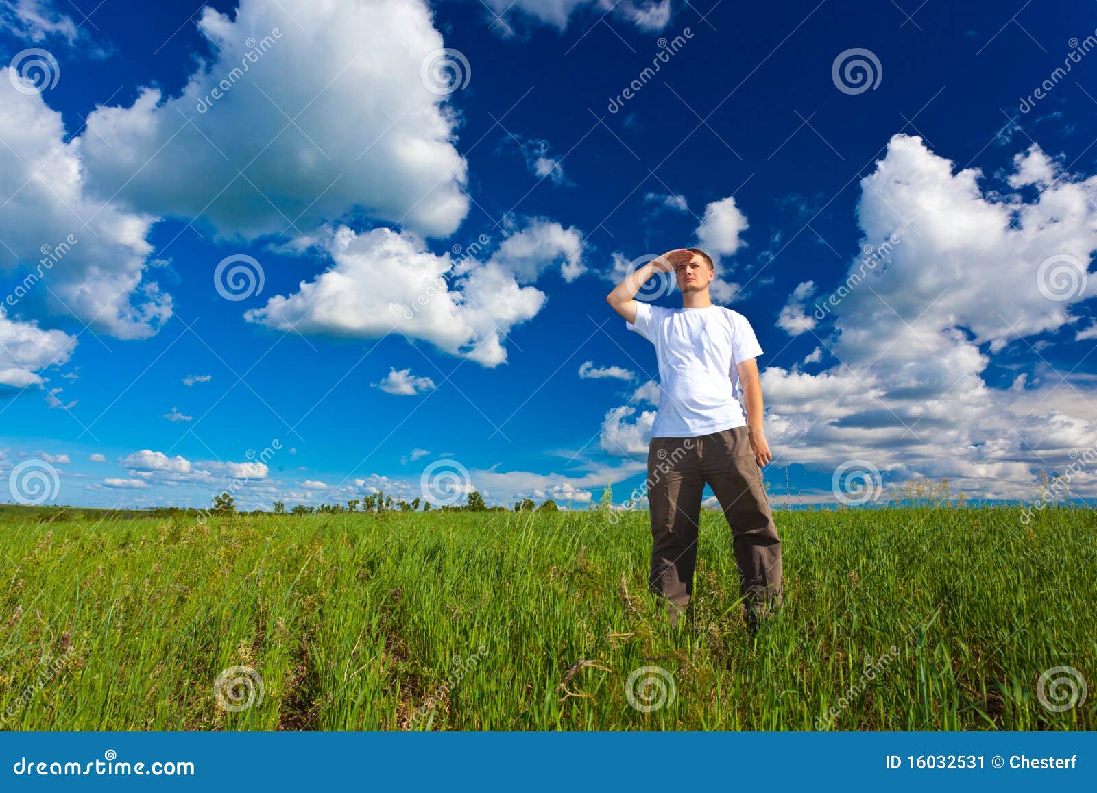 Man on field stock image. Image of grassland, cloudscape - 16032531