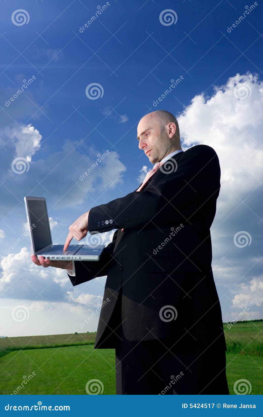 Man in field with laptop stock image. Image of digital - 5424517