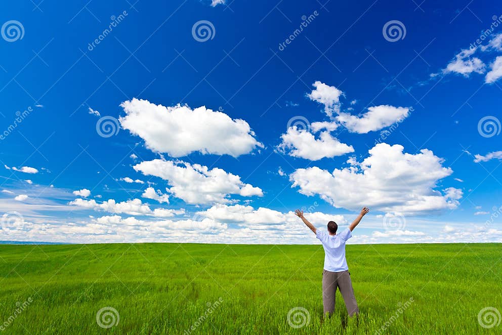 Man on Field Rising Up Hands Stock Photo - Image of landscape ...