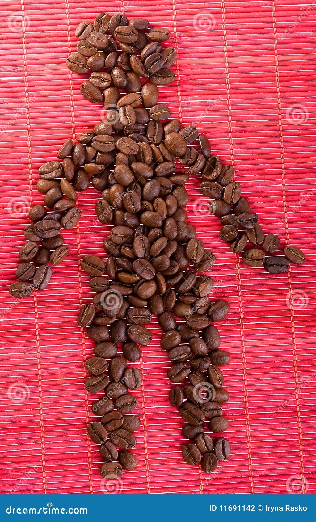 Man Figure Shape by Coffee Beans on a Mat Stock Photo - Image of heap ...