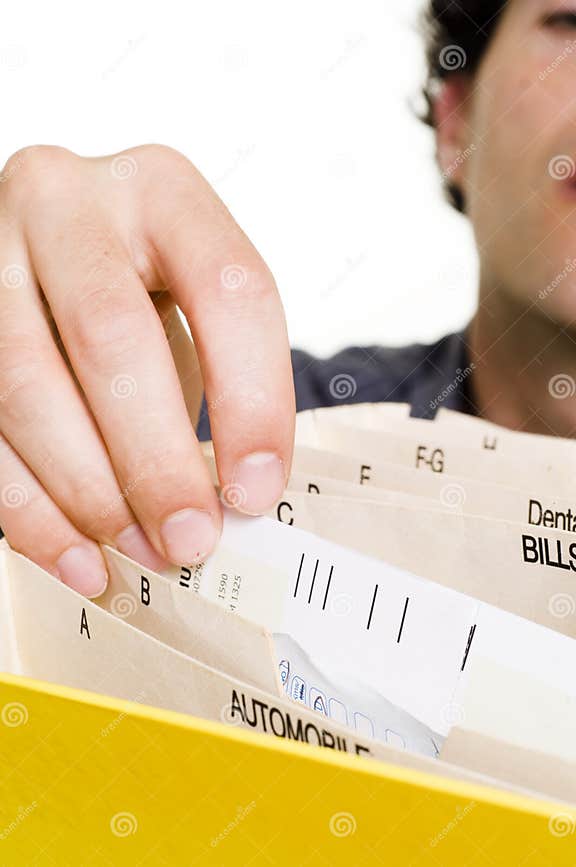Man filing bills stock photo. Image of hand, file, paper - 11726626