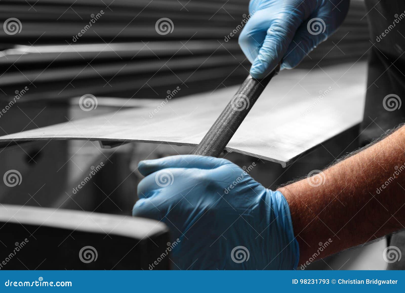 Man Filing Deburring a Metal Panel with a File Stock Image - Image of ...